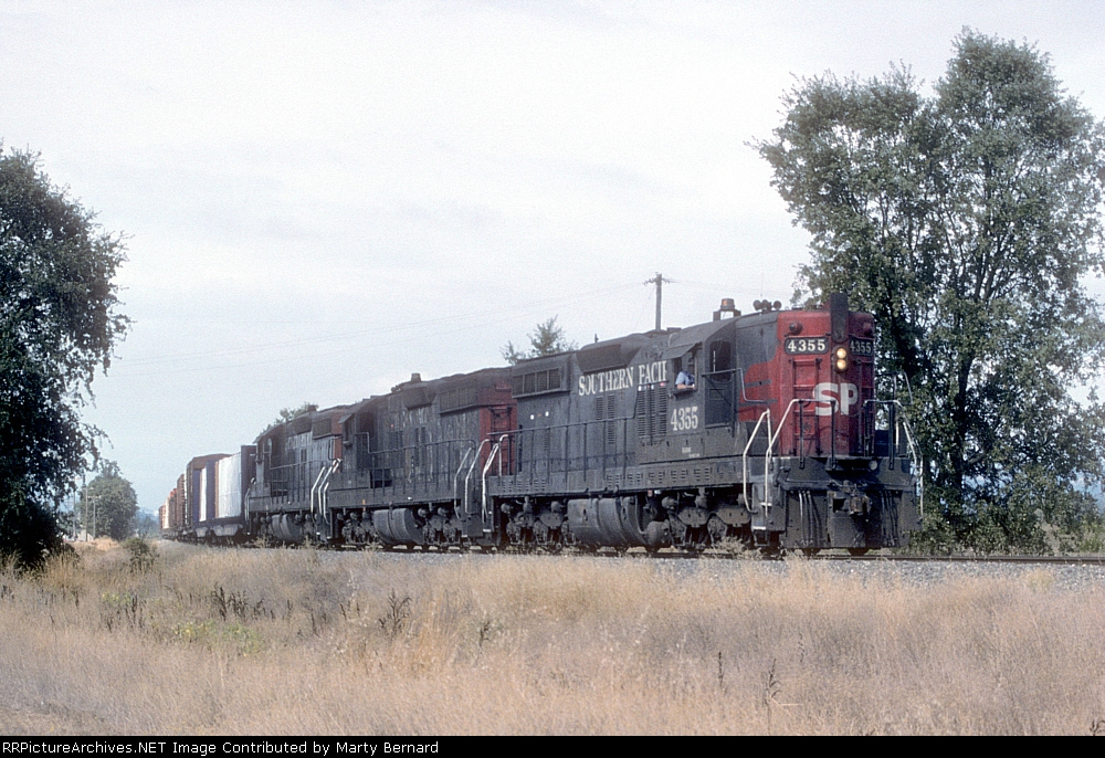 Three Cadillacs Working